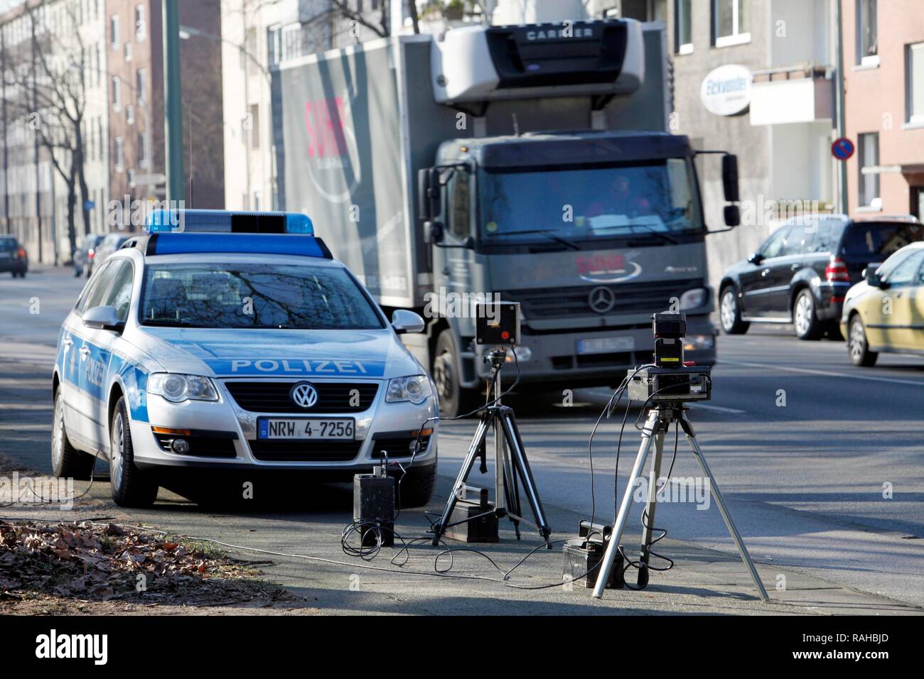 Laser measuring device being used by the police, speed trap marathon of ...