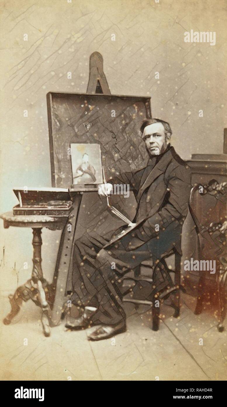 Portrait painter sitting near an easel with a portrait, palette and ...