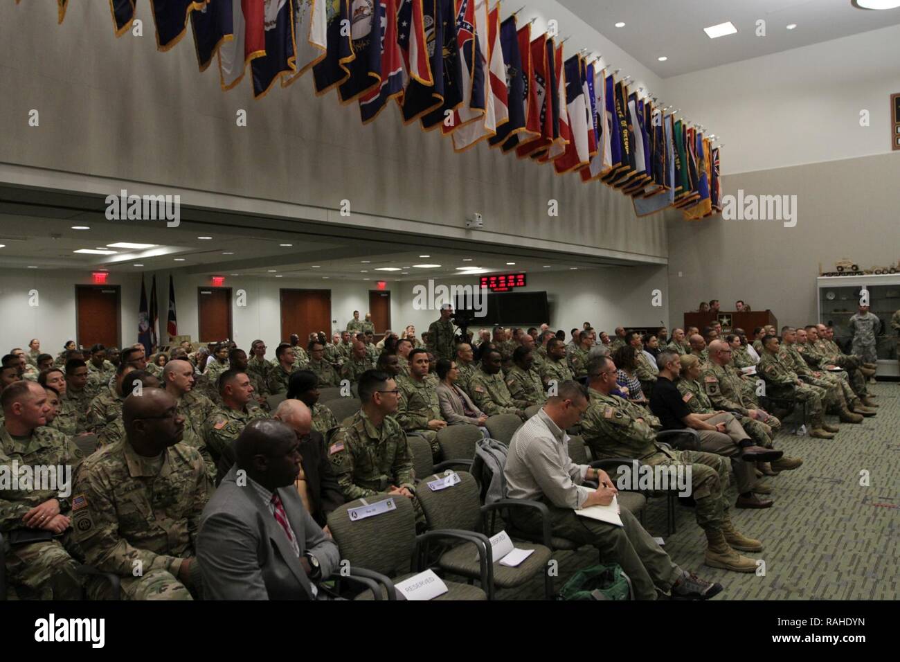U.S. Army Central Soldiers and family members listen to questions ...