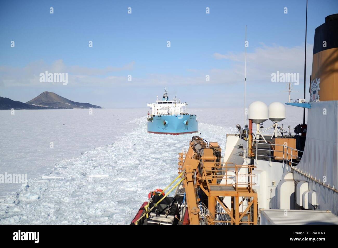 The crew of the U.S. Coast Guard Cutter Polar Star escorts the tanker ...