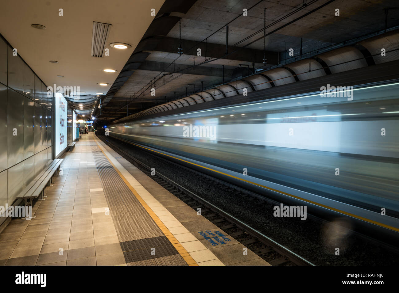 train passing through subway station Stock Photo - Alamy