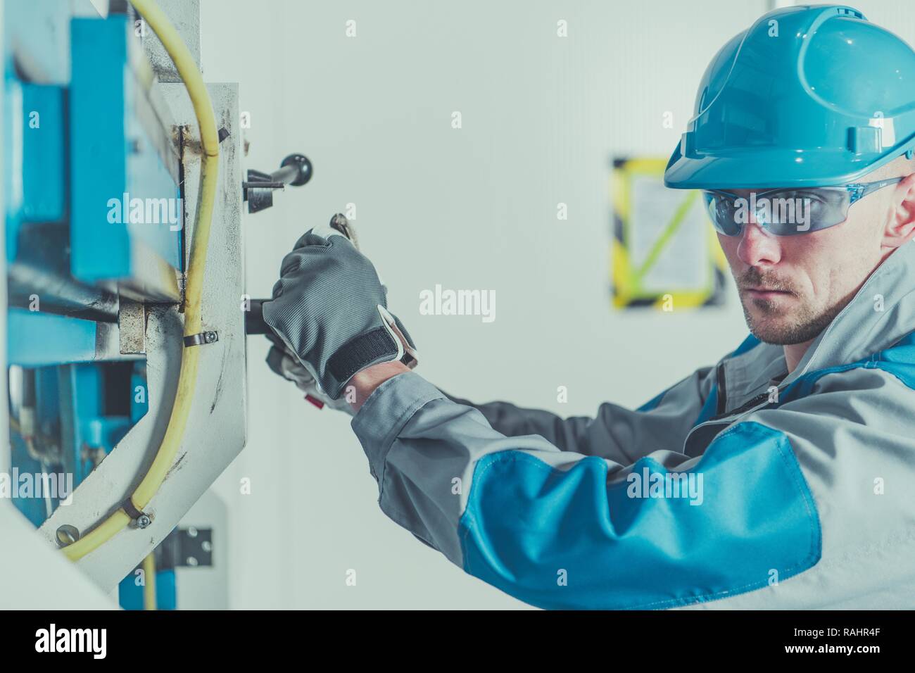 Caucasian Metal Cutting Machine Operator in His 30s. Industrial Theme ...