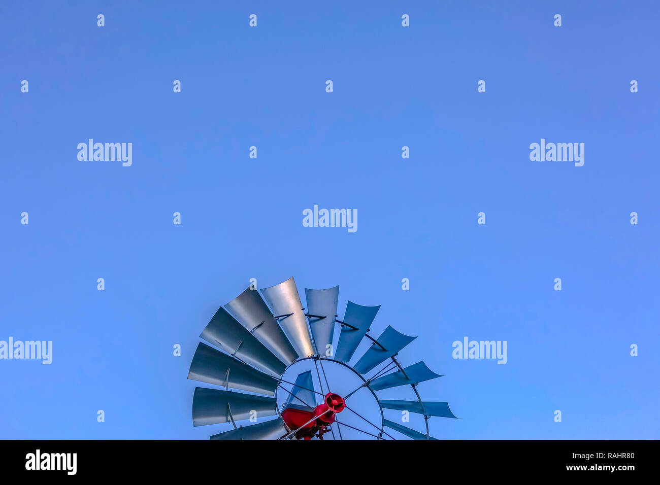 Windmill silhouette tower sunset glow dusk hi-res stock photography and ...