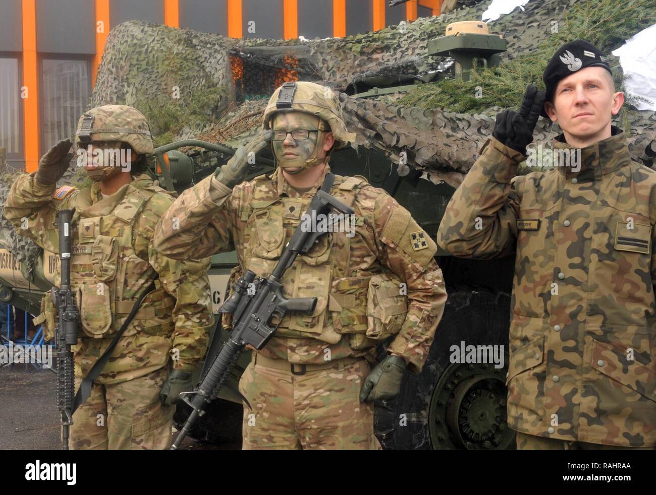 Spc. Nicolas Kotsonis(middle) and Spc. Erinne Bowyer(left), both ...