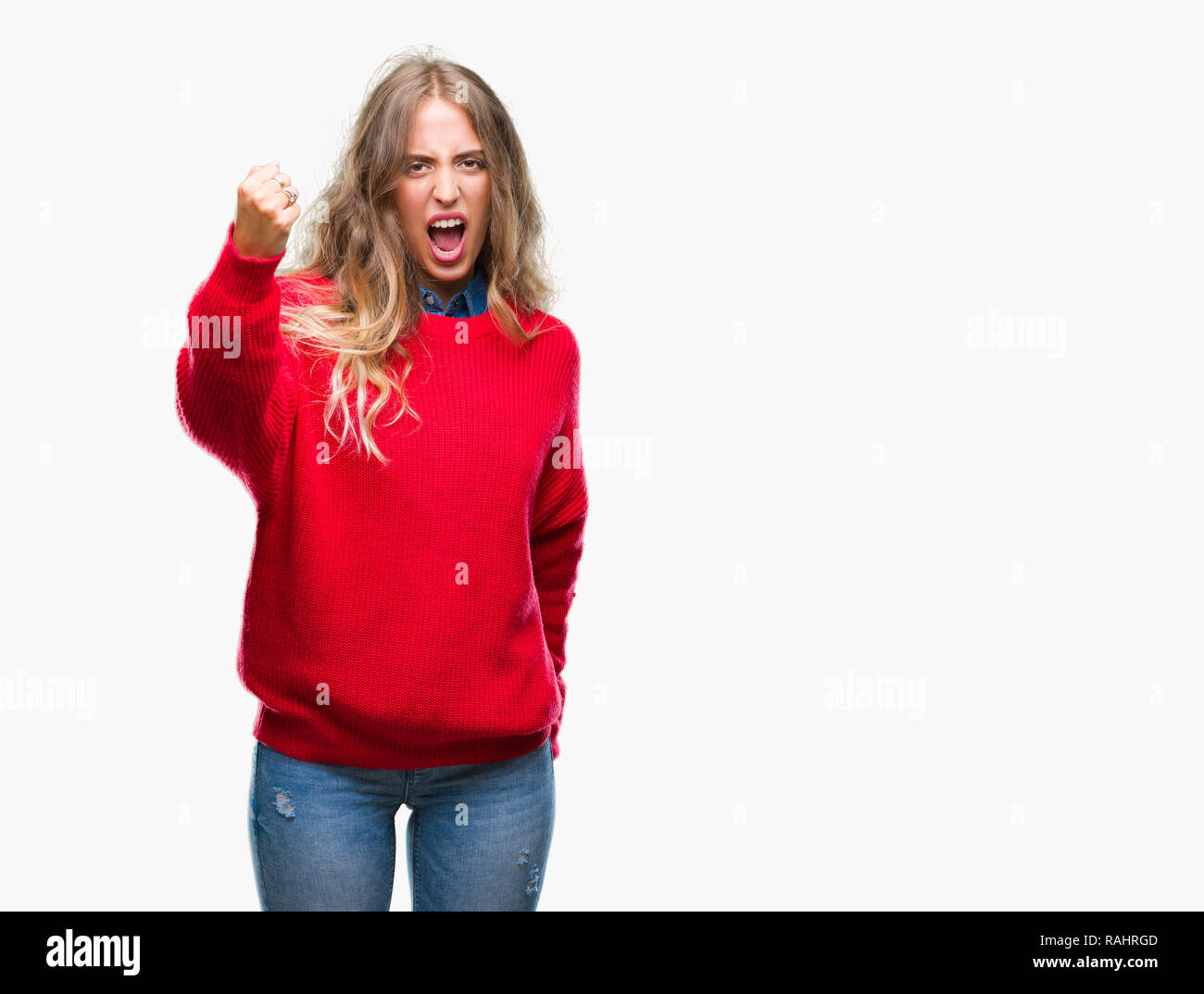 Beautiful young blonde woman wearing winter sweater over isolated ...