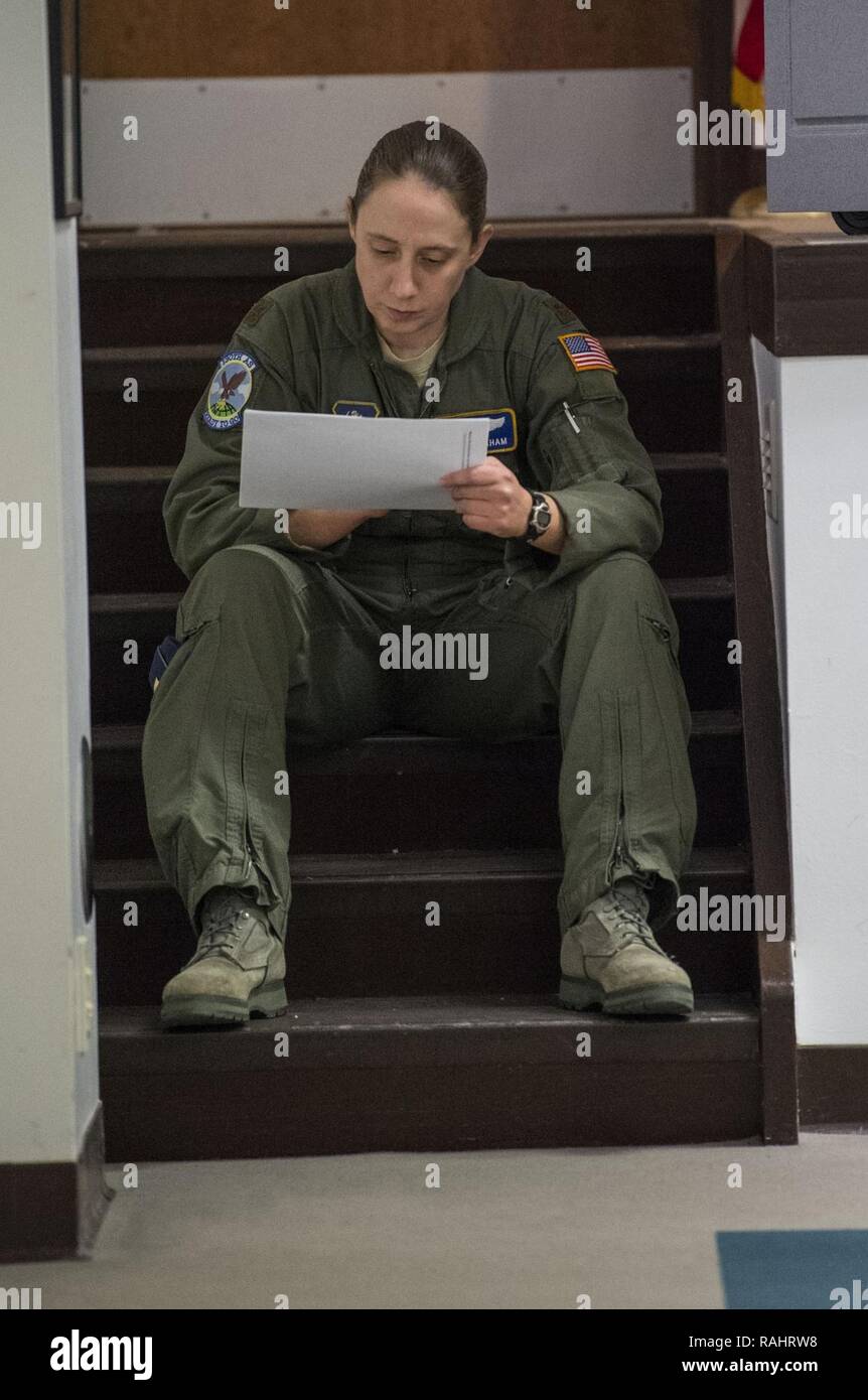 Maj. Mindy Graham, 130th Airlift Wing pilot, reviews last minute ...