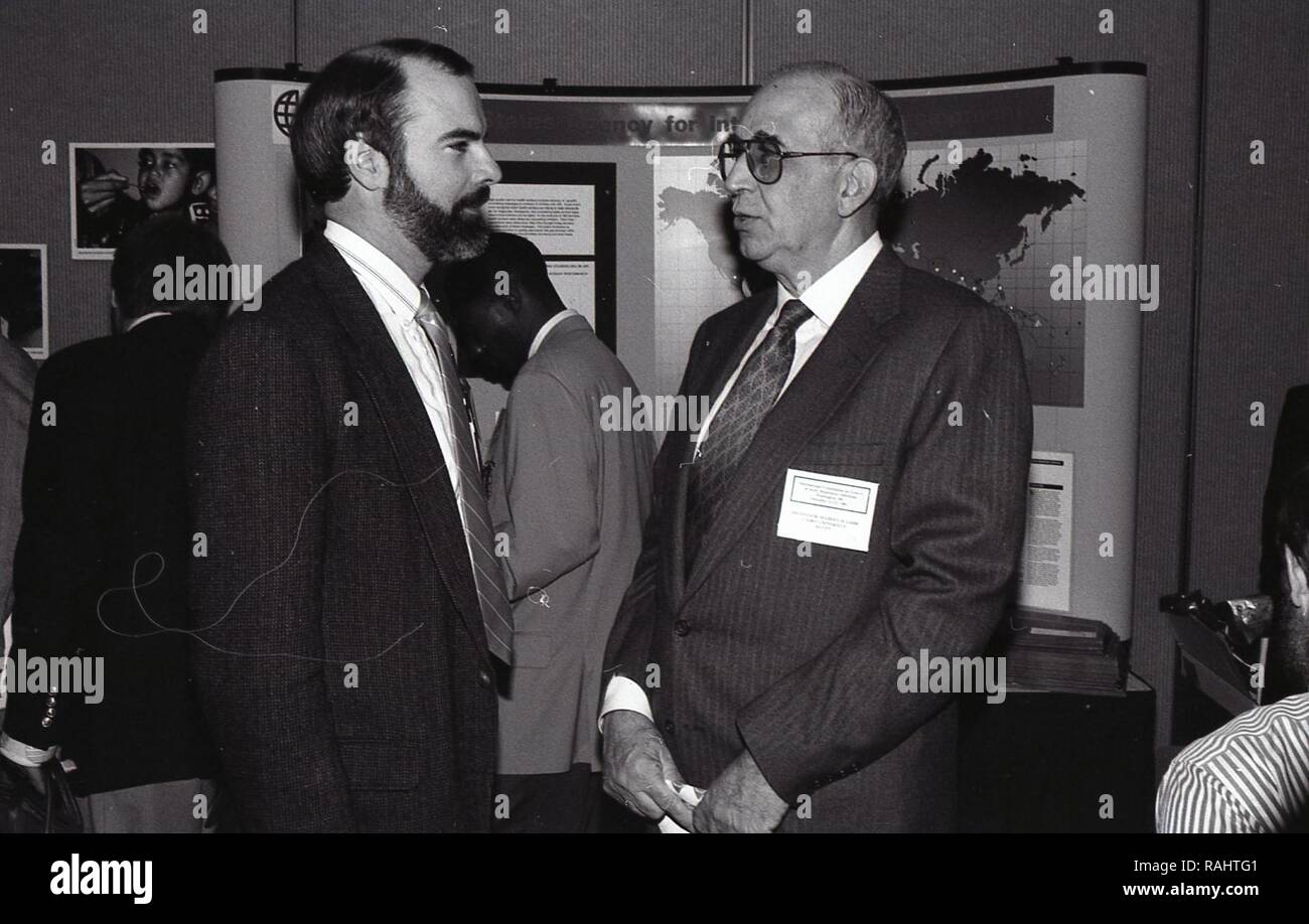 TWO MEN ARE HAVING A CONVERSATION Stock Photo - Alamy