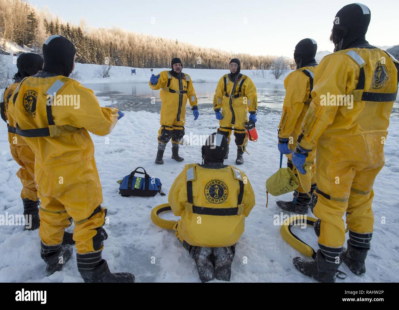 Kirk Gibbs, center, a fire captain assigned to the 673rd Civil Engineer ...