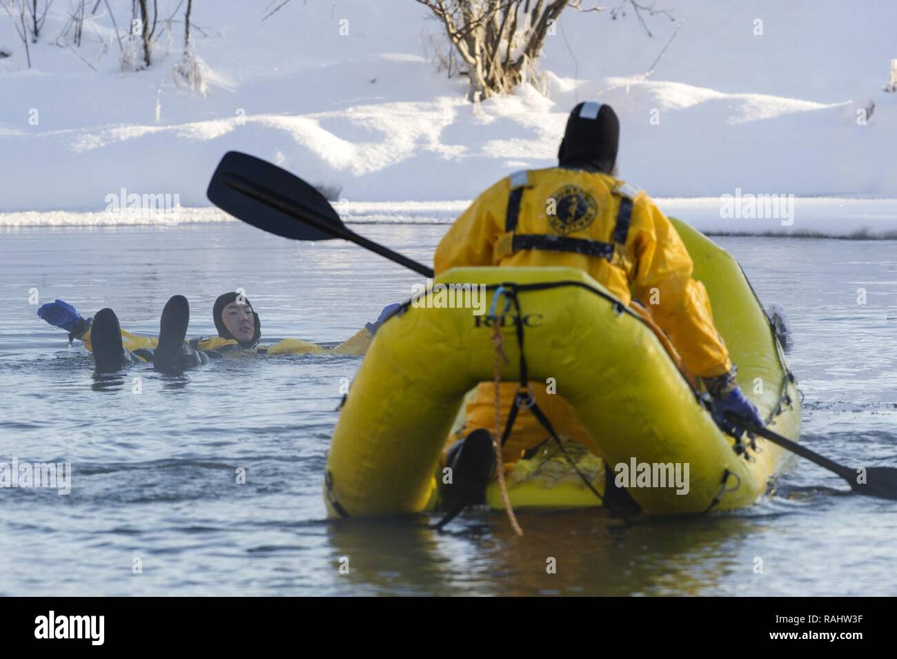 U.S. Air Force fire protection specialists, assigned to the 673rd Civil ...