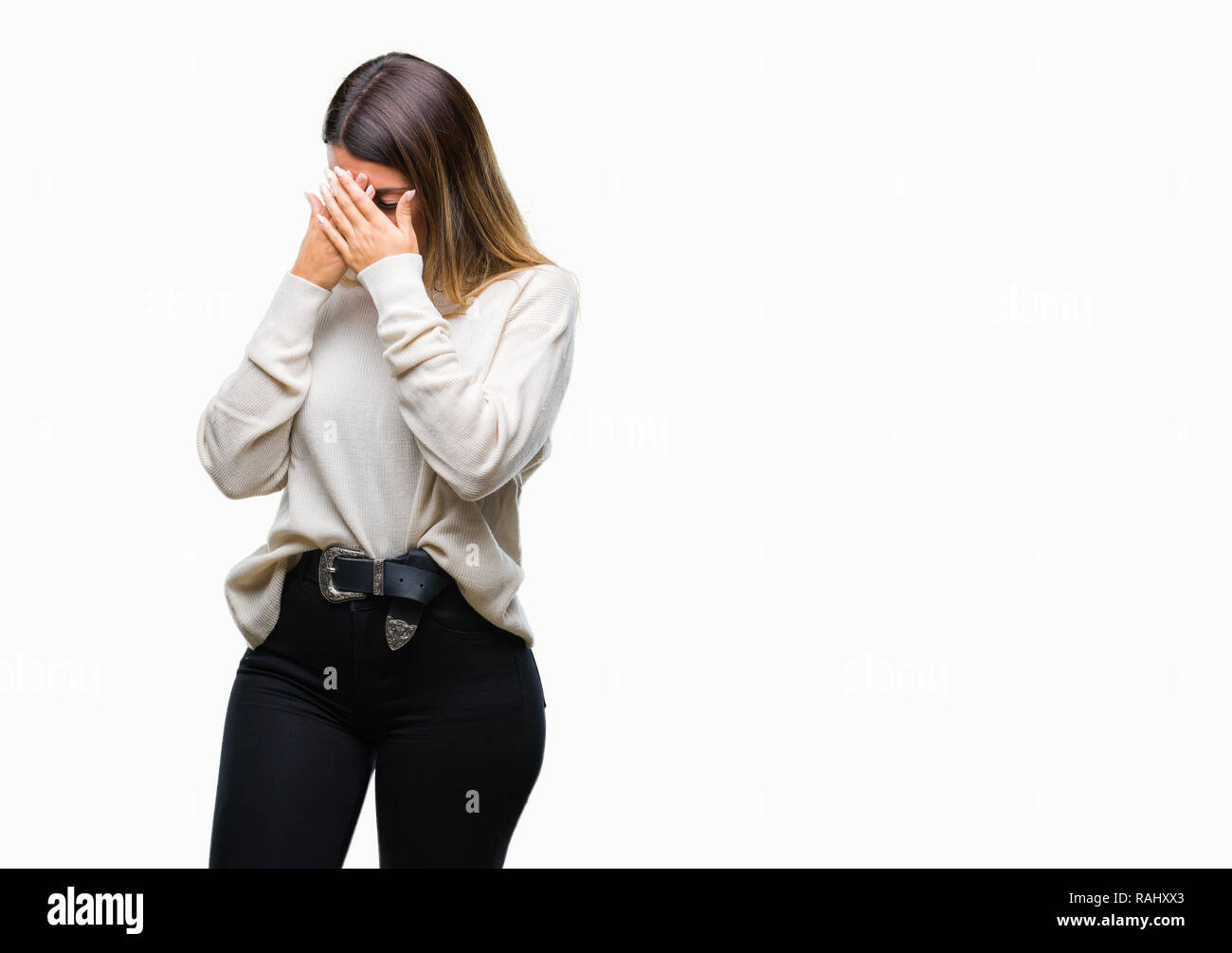 Young beautiful woman casual white sweater over isolated background ...