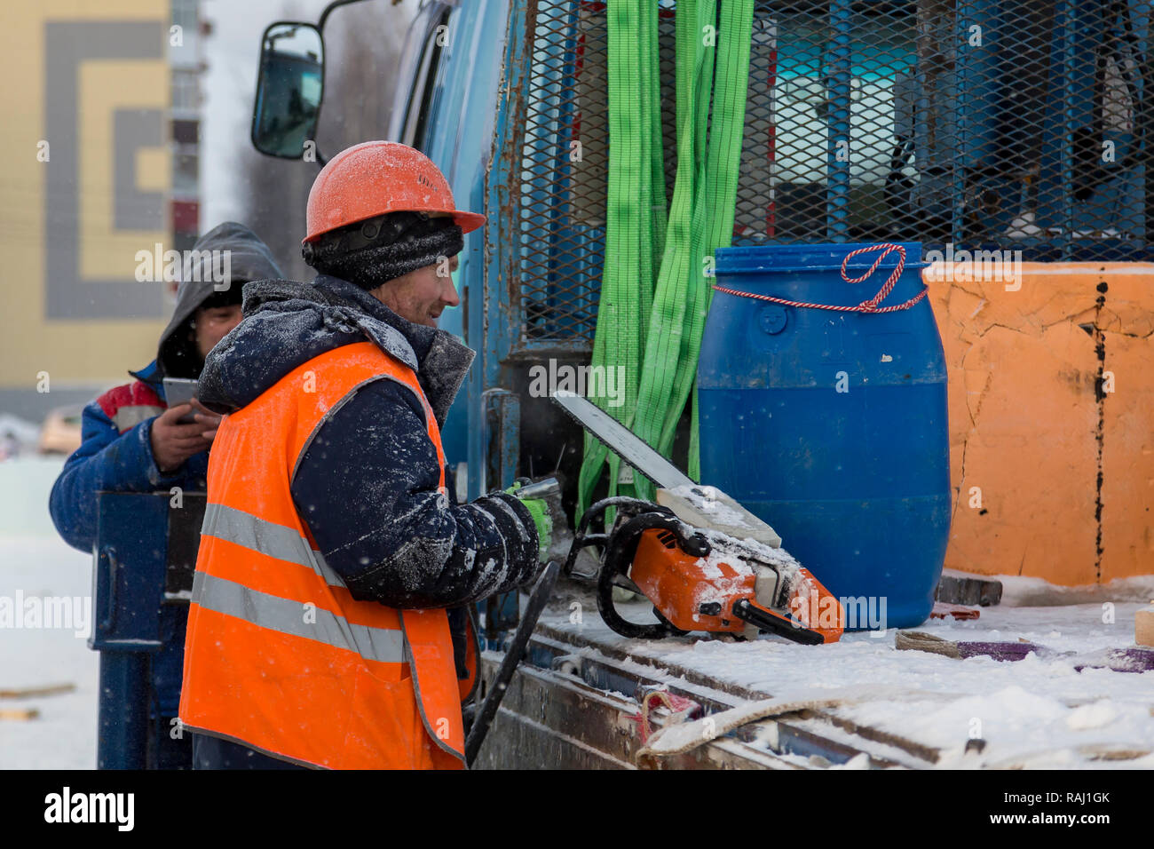 Workers on the construction site of the ice town in a good mood Stock ...