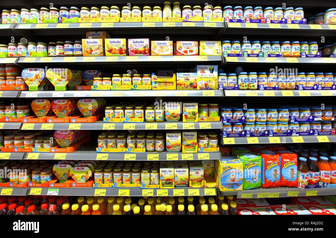 Baby food in jars, shelves, self-service Stock Photo - Alamy
