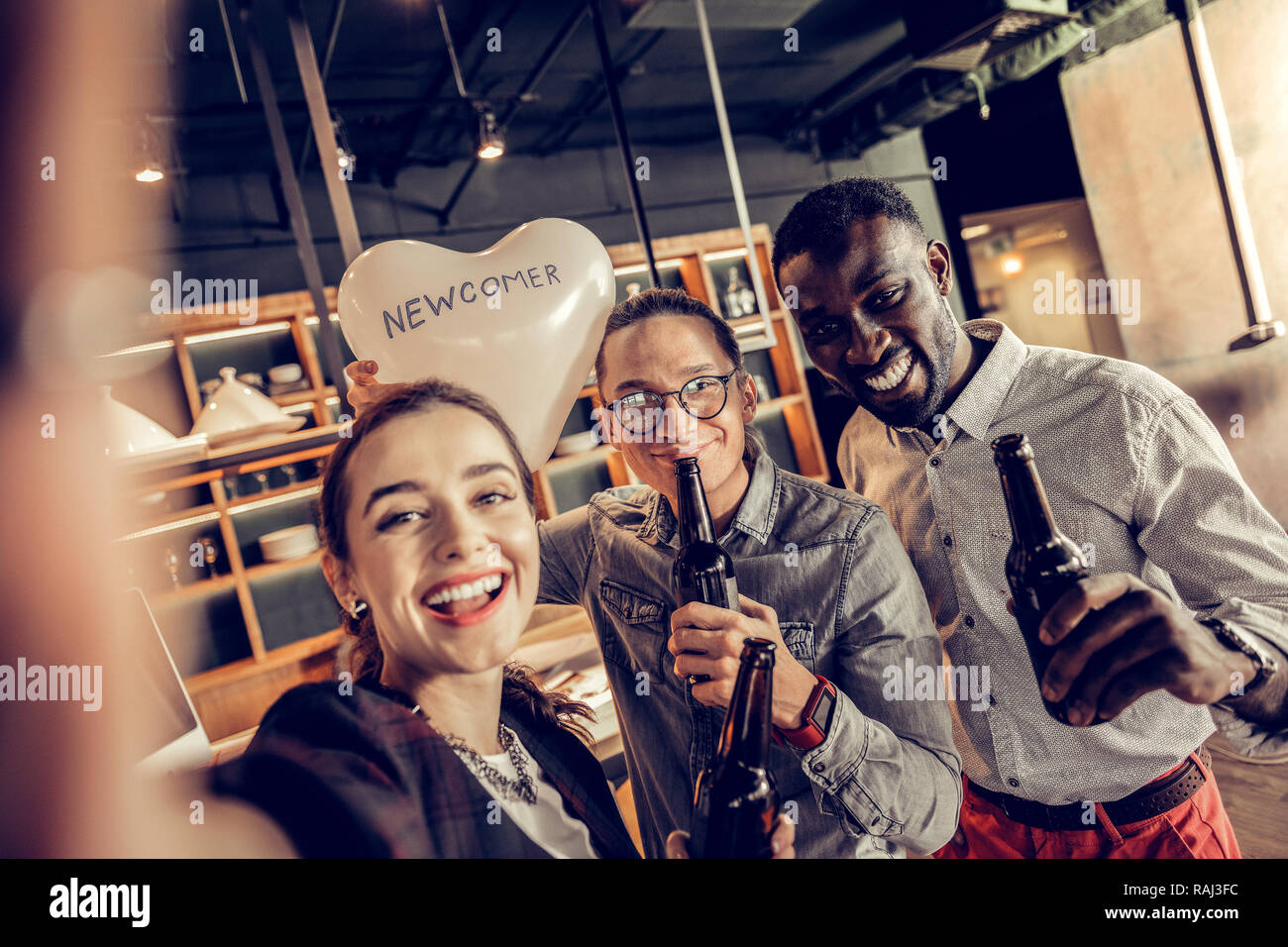 Cute brunette girl looking straight at camera Stock Photo - Alamy