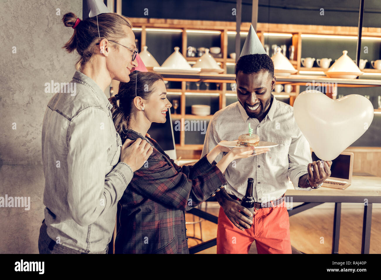 Delighted male person making wish during celebration Stock Photo - Alamy