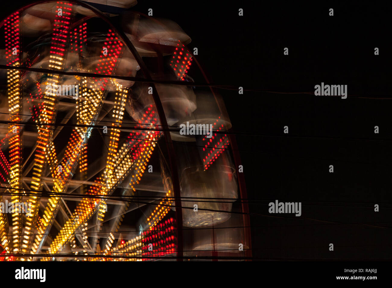 Wallpaper background of spinning Ferris Wheel with yellow and red ...