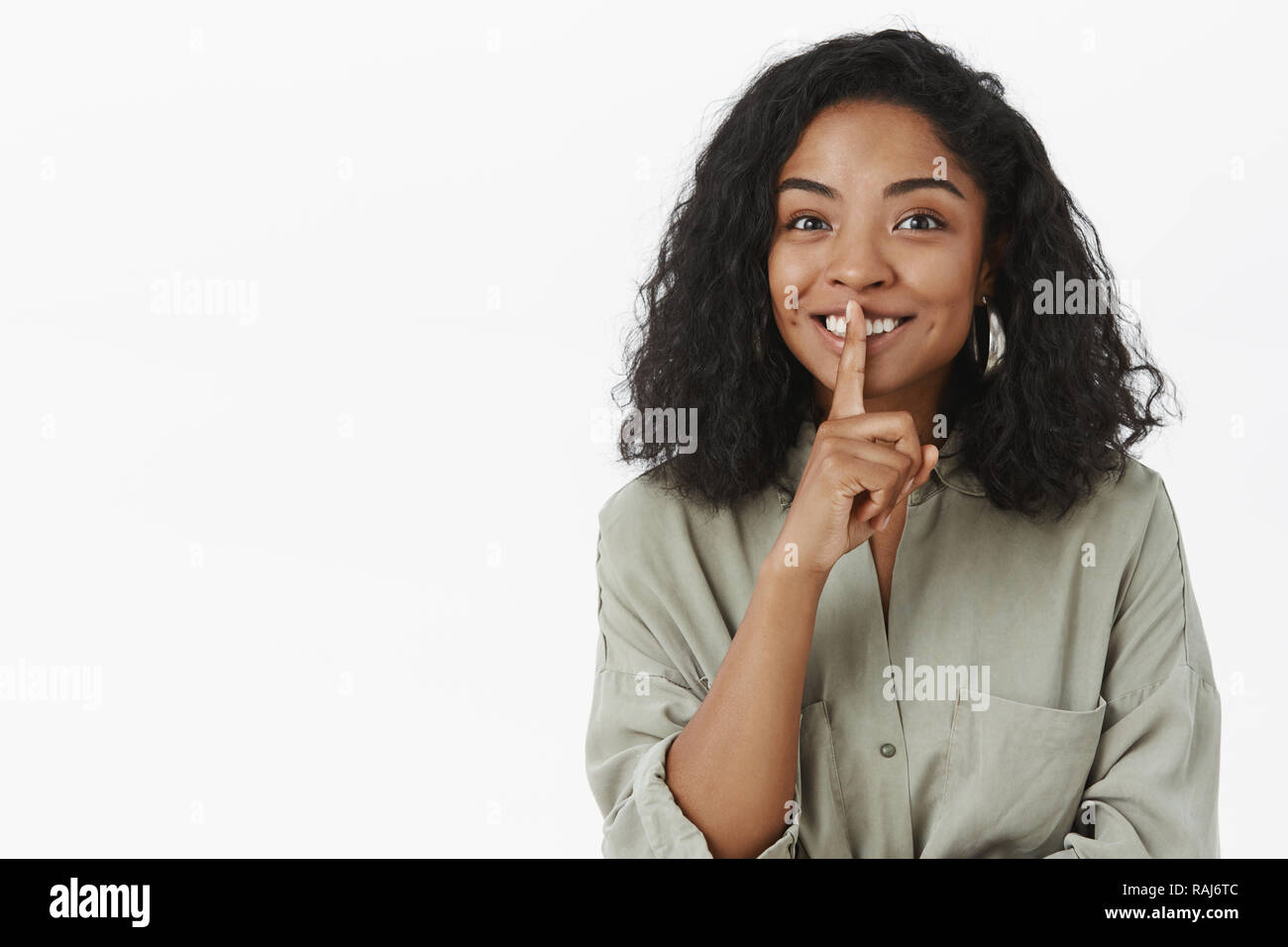 Shh can you keep secrets. Portrait of charming friendly-looking ...