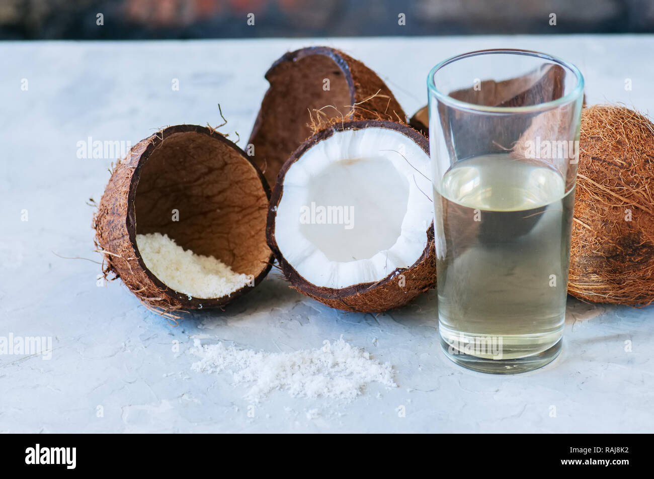 Coconut water, whole coconuts on a white background. Coconut products ...