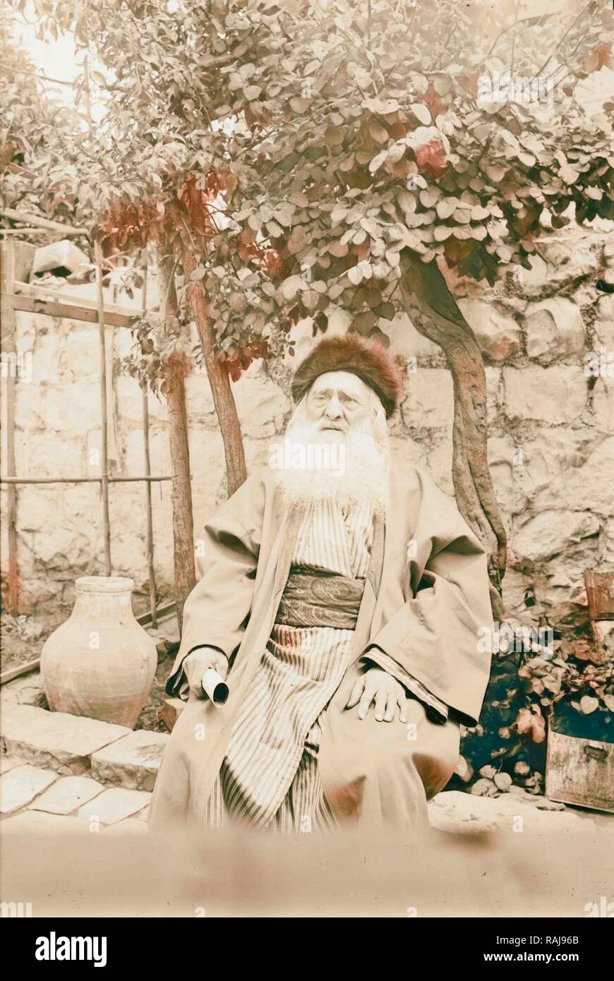 Elderly Jewish man, seated under tree 1898, Middle East, Israel and/or ...