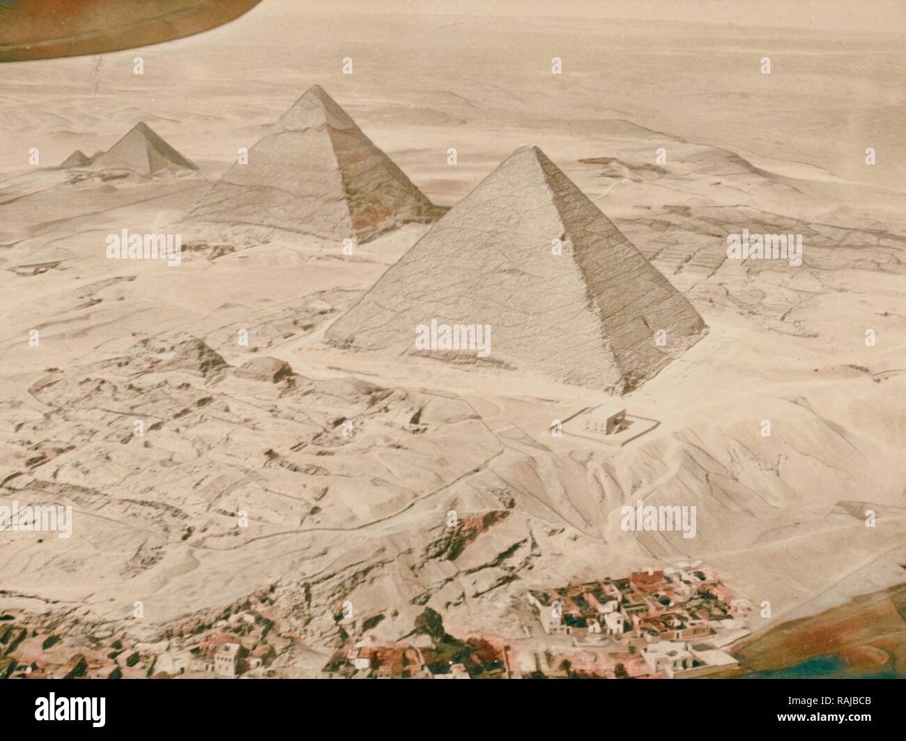 Cairo and the pyramids. Pyramids of Gizeh. Looking down on the three ...
