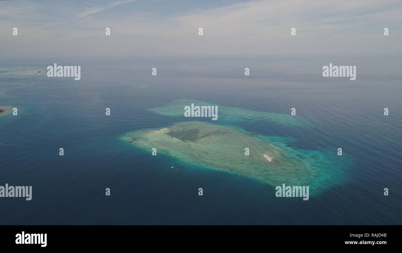 seascape aerial view coral reef, atoll with turquoise water in sea ...