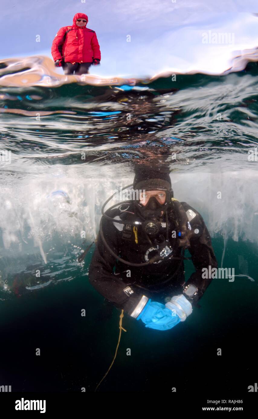 Diver, ice-diving, in Lake Baikal, Olkhon island, Siberia, Russia Stock ...