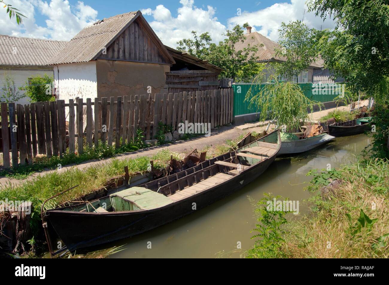 Boat on canal in Vilkovo or Vylkove, also known as "Ukrainian Venice ...