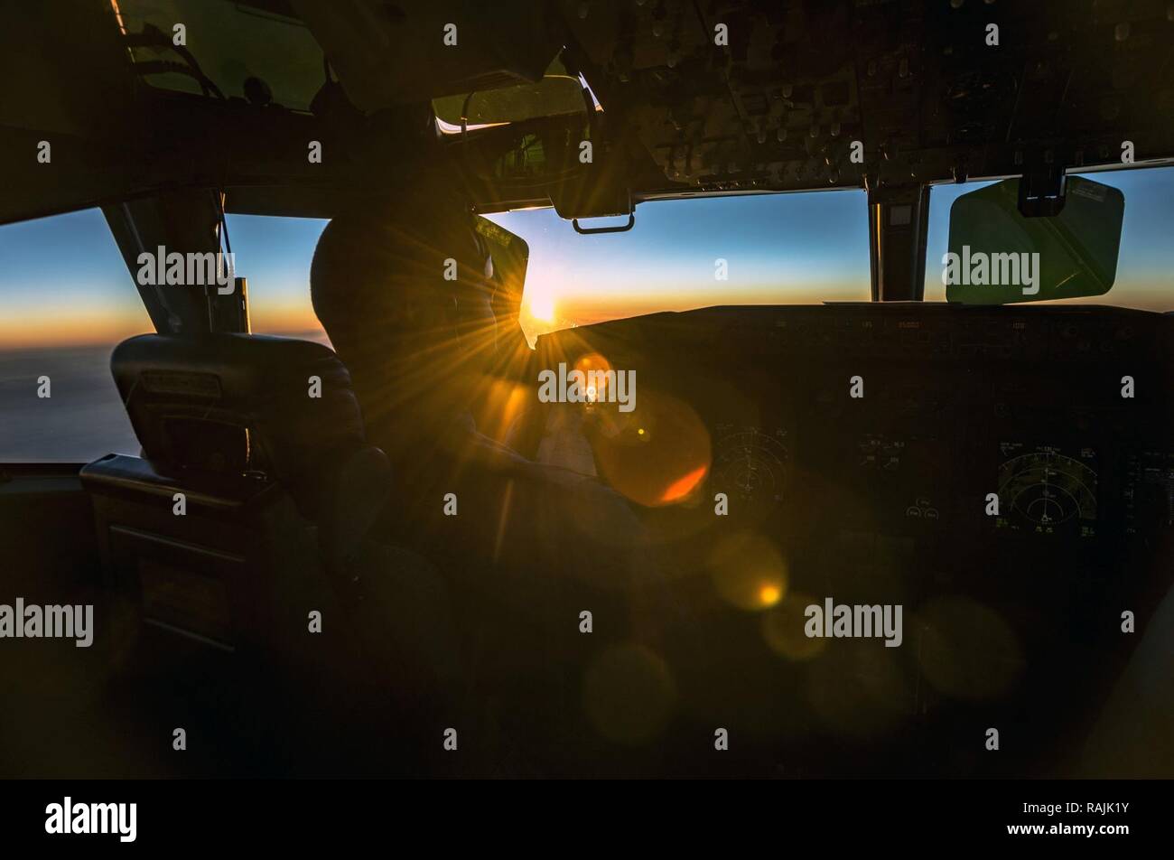 Lt. Col. Aaron Pierce, 1st Airlift Squadron C-40B chief pilot, cruises ...