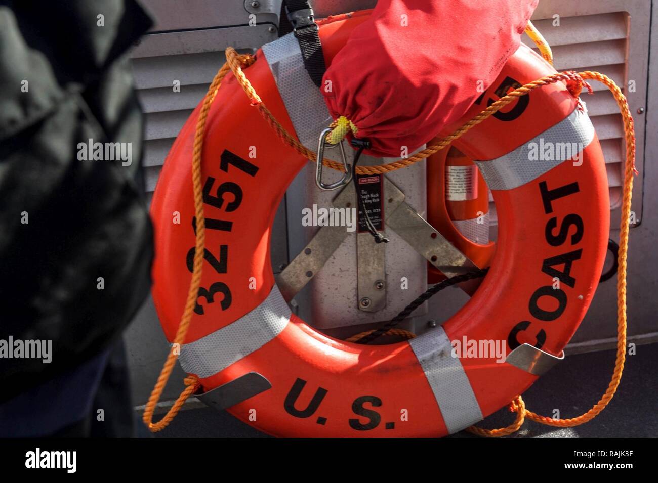 A ring buoy life preservation device is hung on a boat as Port Security ...