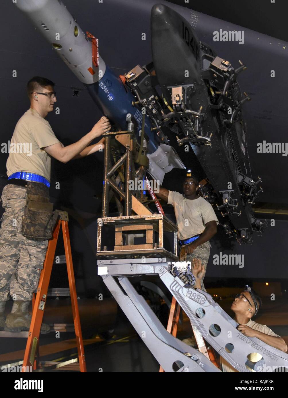 A weapons load crew begins disarming a B-52 Stratofortress at Barksdale ...