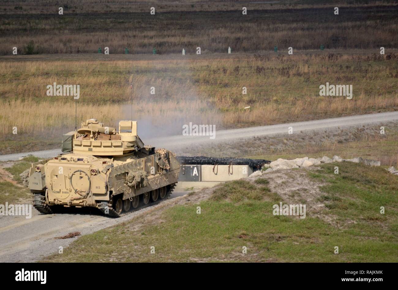 A M2A2 Bradley Fighting Vehicle from 1st Battalion, 64th Armor Regiment ...