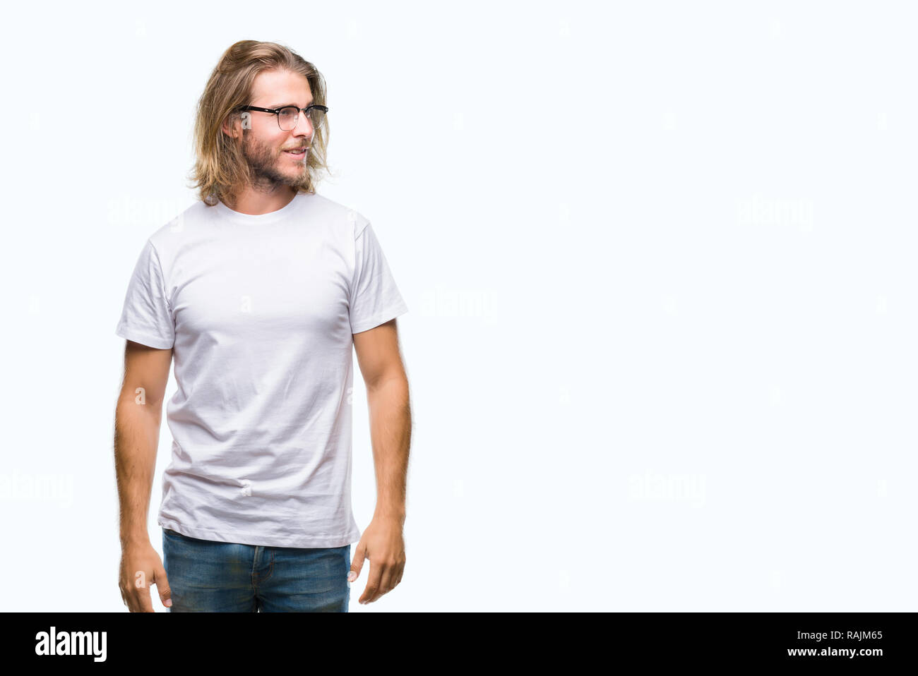 Young handsome man with long hair wearing glasses over isolated ...