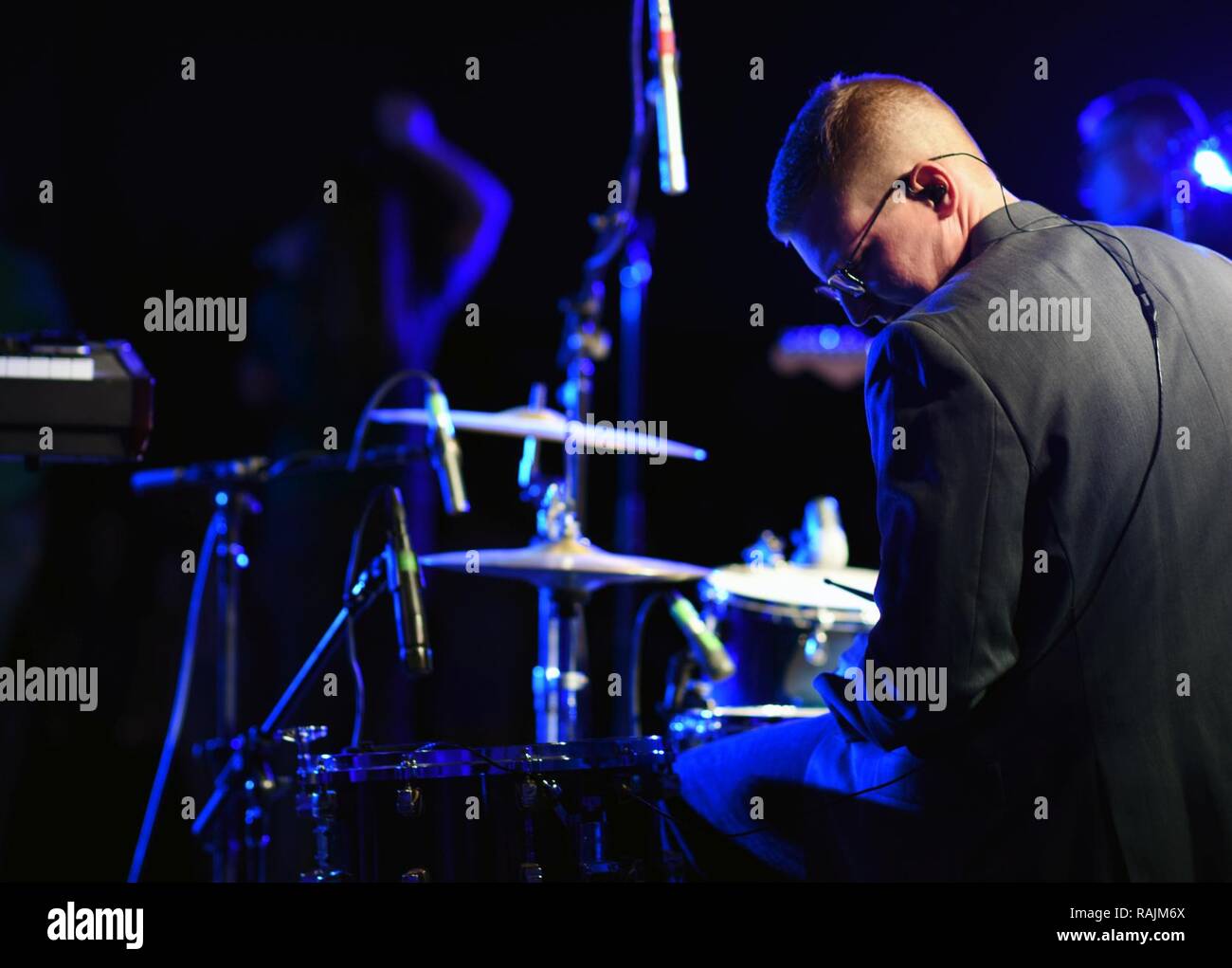 U.S. Air Force Airman 1st Class Chris Hanson, a drummer with the U.S ...