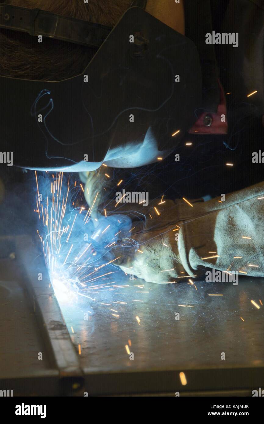 Spc. Brett Alkire, a machinist/welder with Bravo Company, 703rd Brigade ...