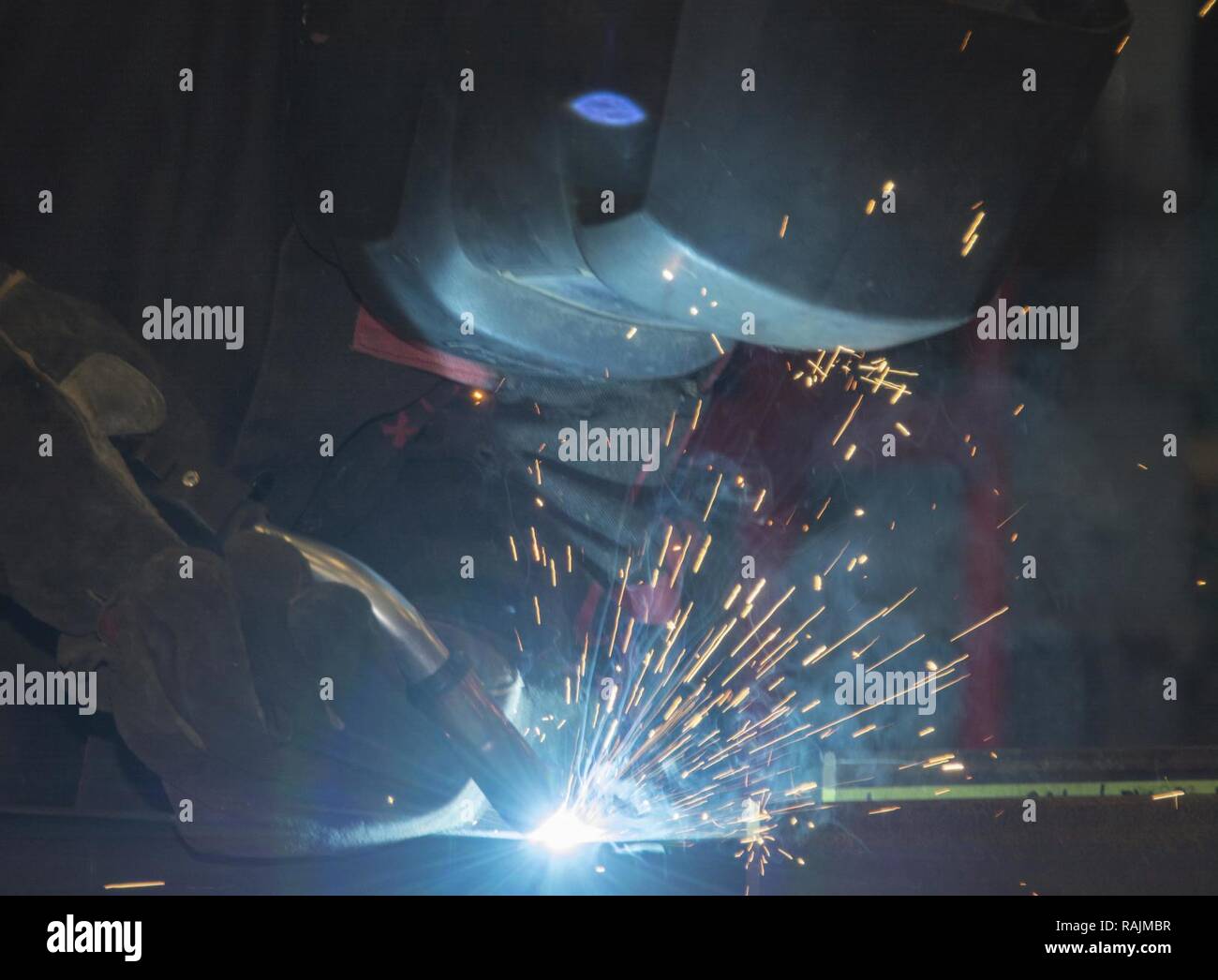 Spc. Brett Alkire, a machinist/welder with Bravo Company, 703rd Brigade ...