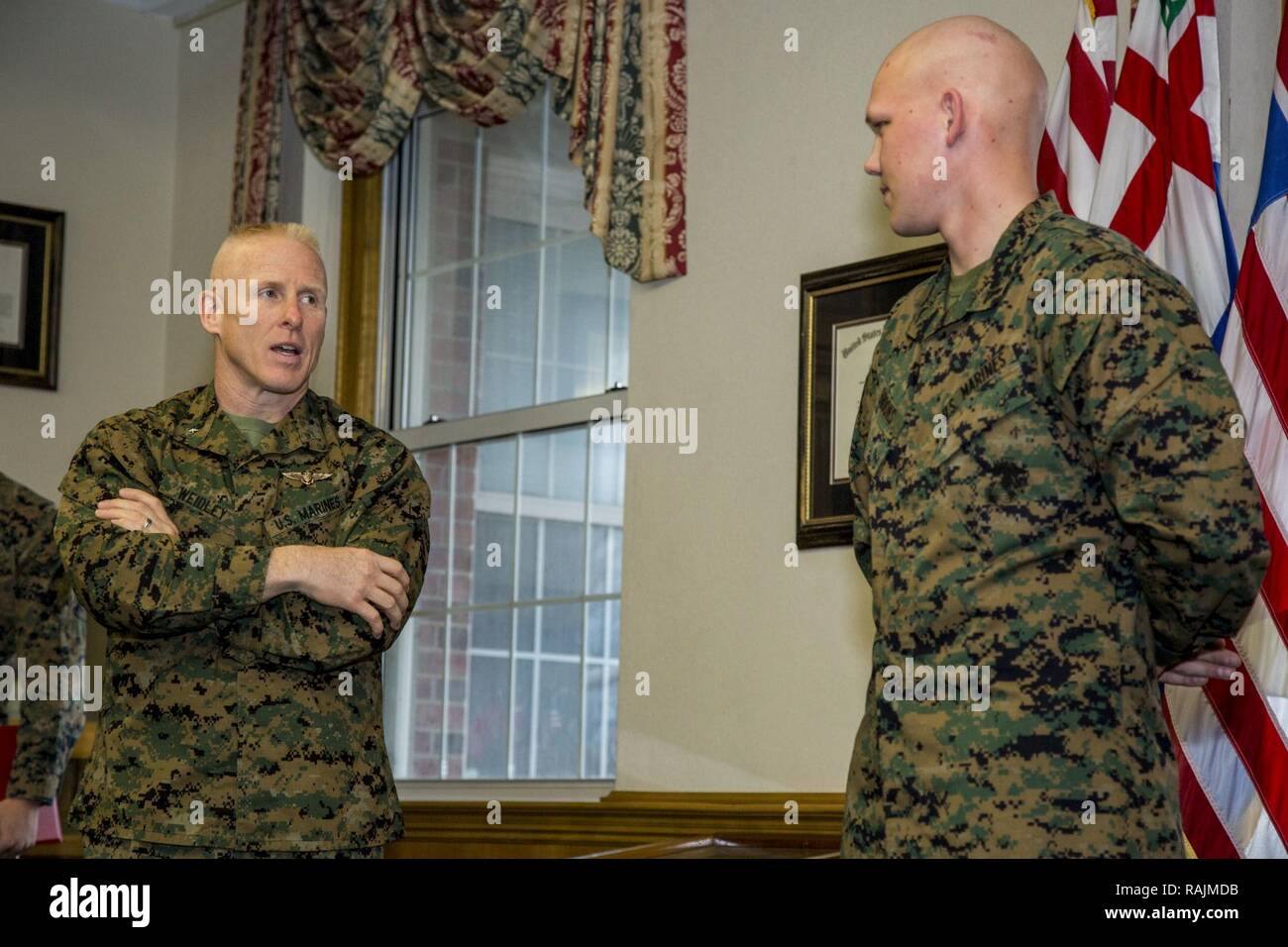 U.S. Marine Corps Brig. Gen. Thomas D. Weidley left, commanding general ...