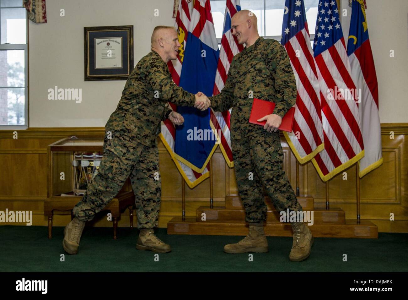 U.S. Marine Corps Brig. Gen. Thomas D. Weidley, left, commanding ...