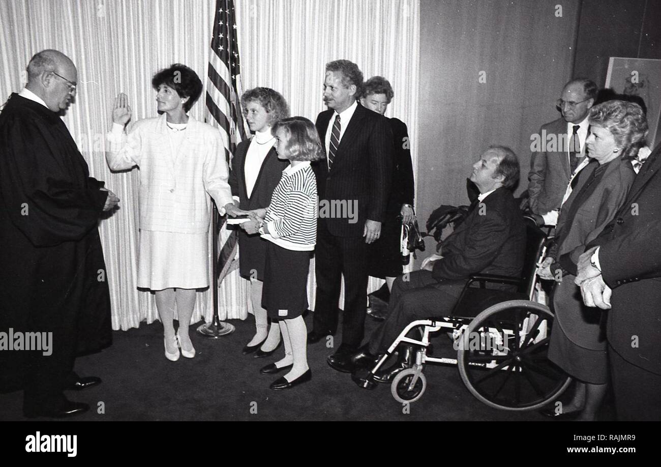 CAROL ADELMAN IS TAKING A PLEDGE FROM THE JUDGE AND FAMILY MEMBERS ARE ...