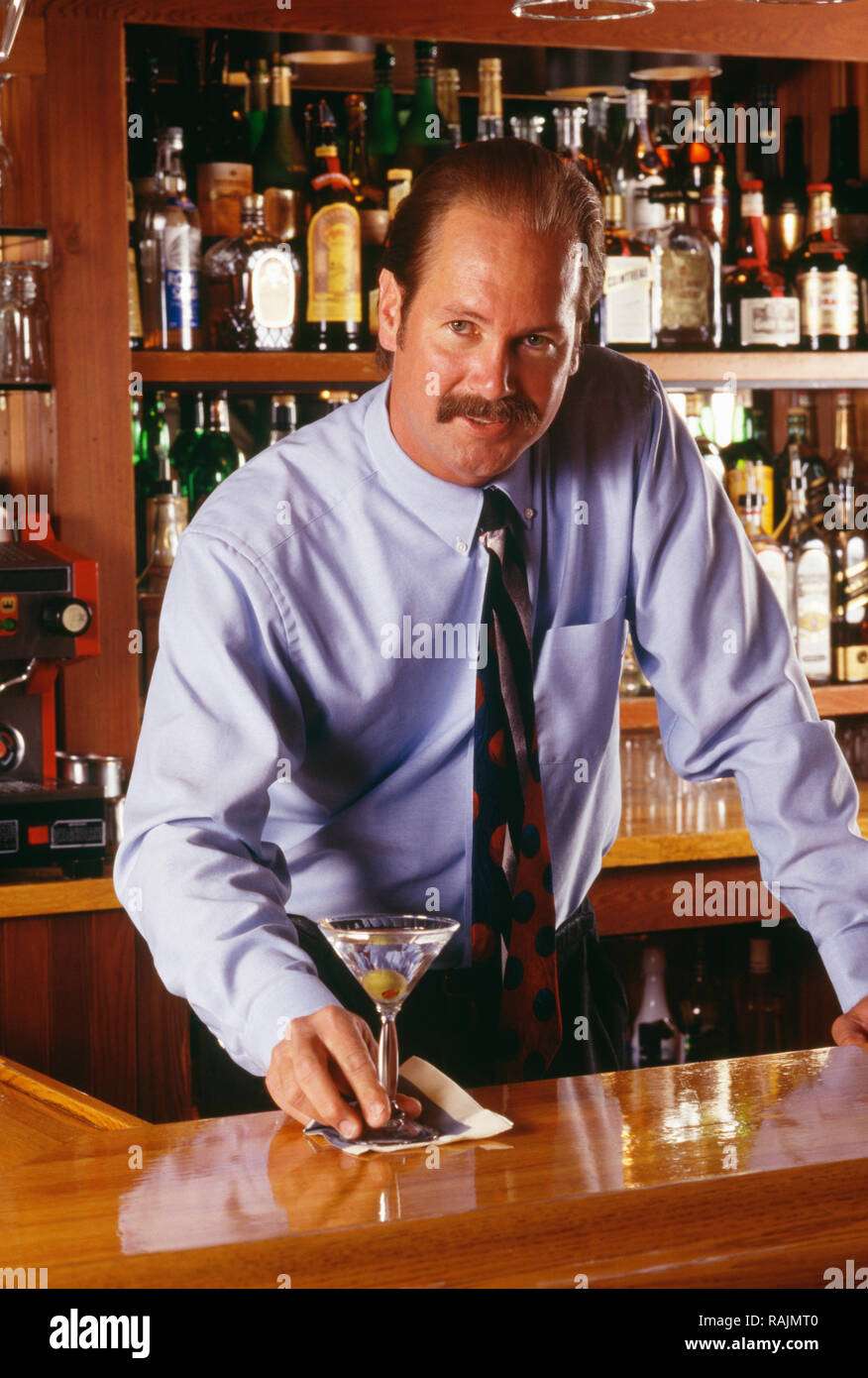 Liquor bottles behind bar hi-res stock photography and images - Alamy