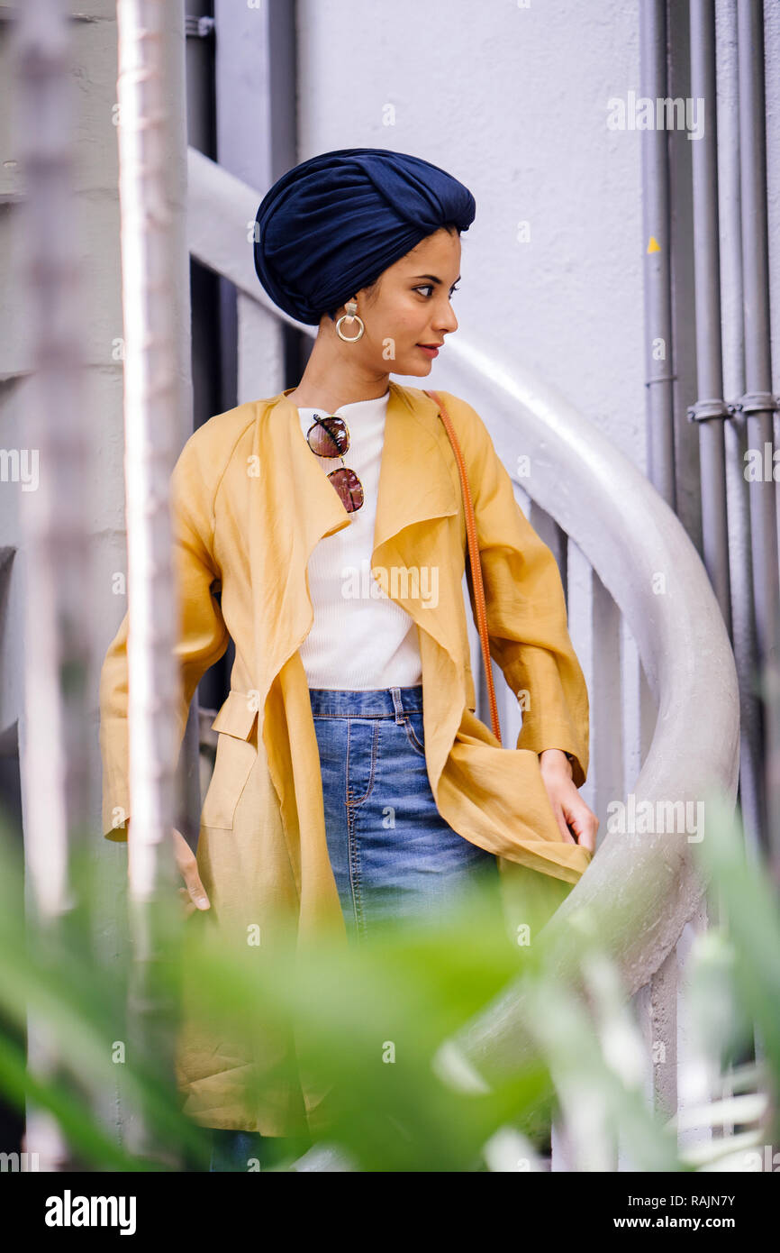Fashion portrait of a young, beautiful Arab Middle Eastern woman in a ...