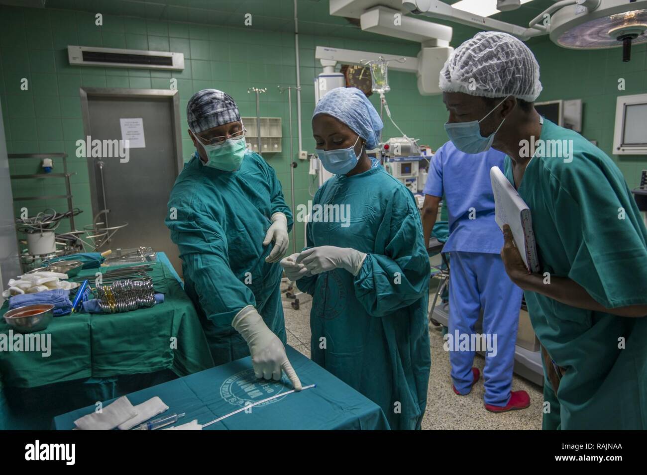 U.S. Army Staff Sgt. Stewart Lee, an operating room specialist assigned ...