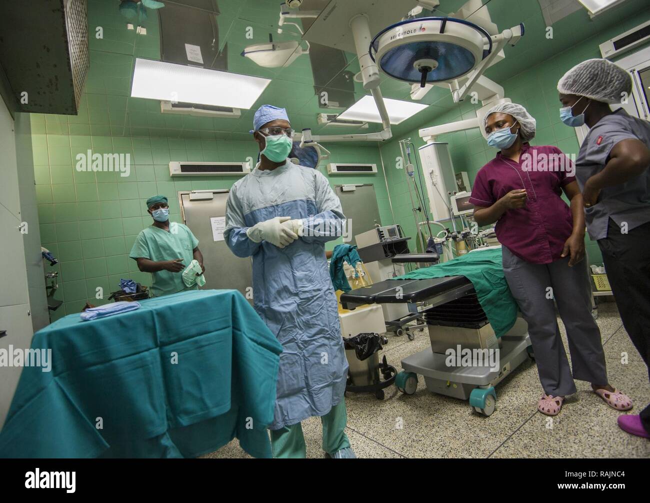 U.S. Army Sgt. Michael Harvey, an operating room specialist assigned to ...