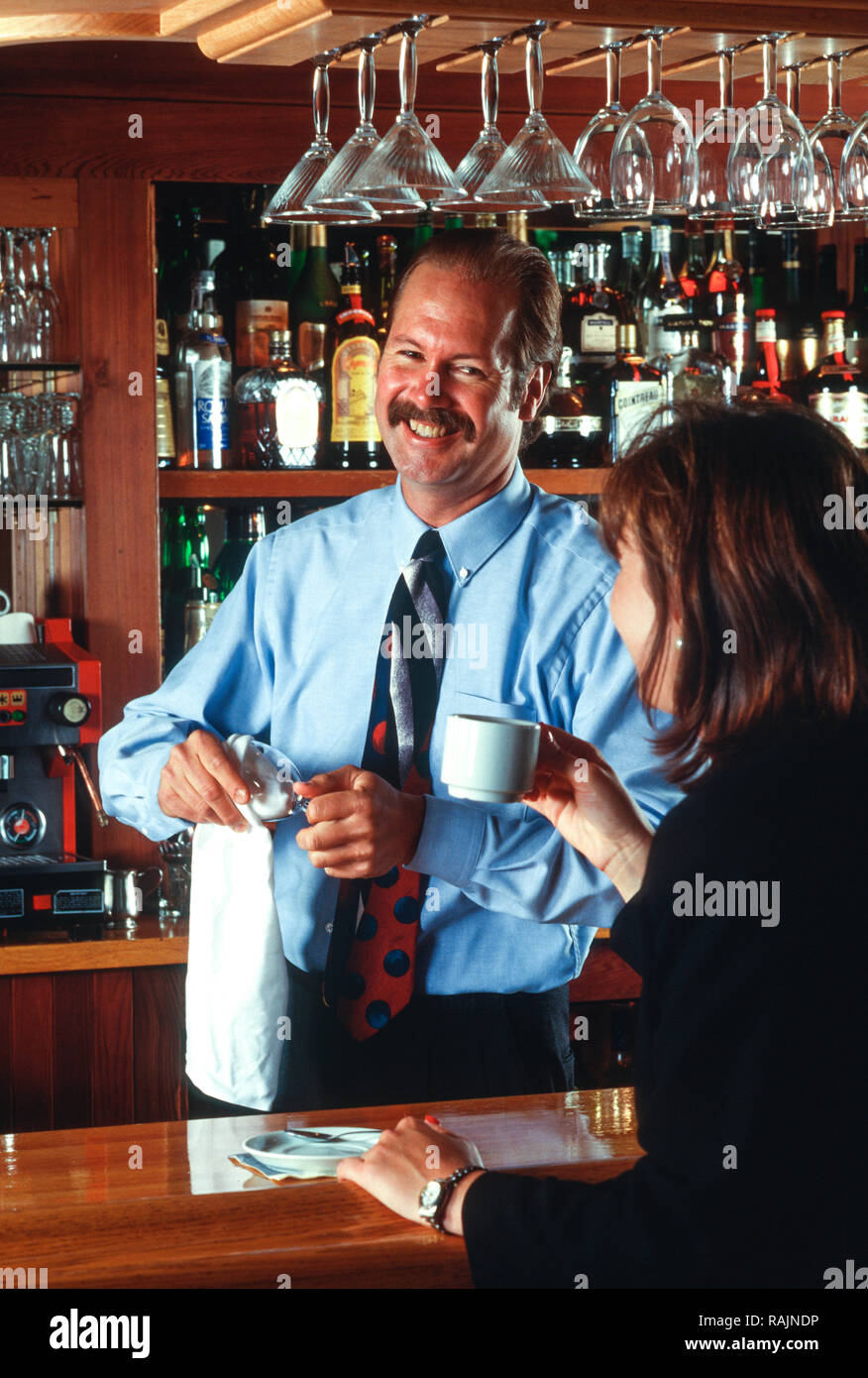 Liquor bottles behind bar hi-res stock photography and images - Alamy
