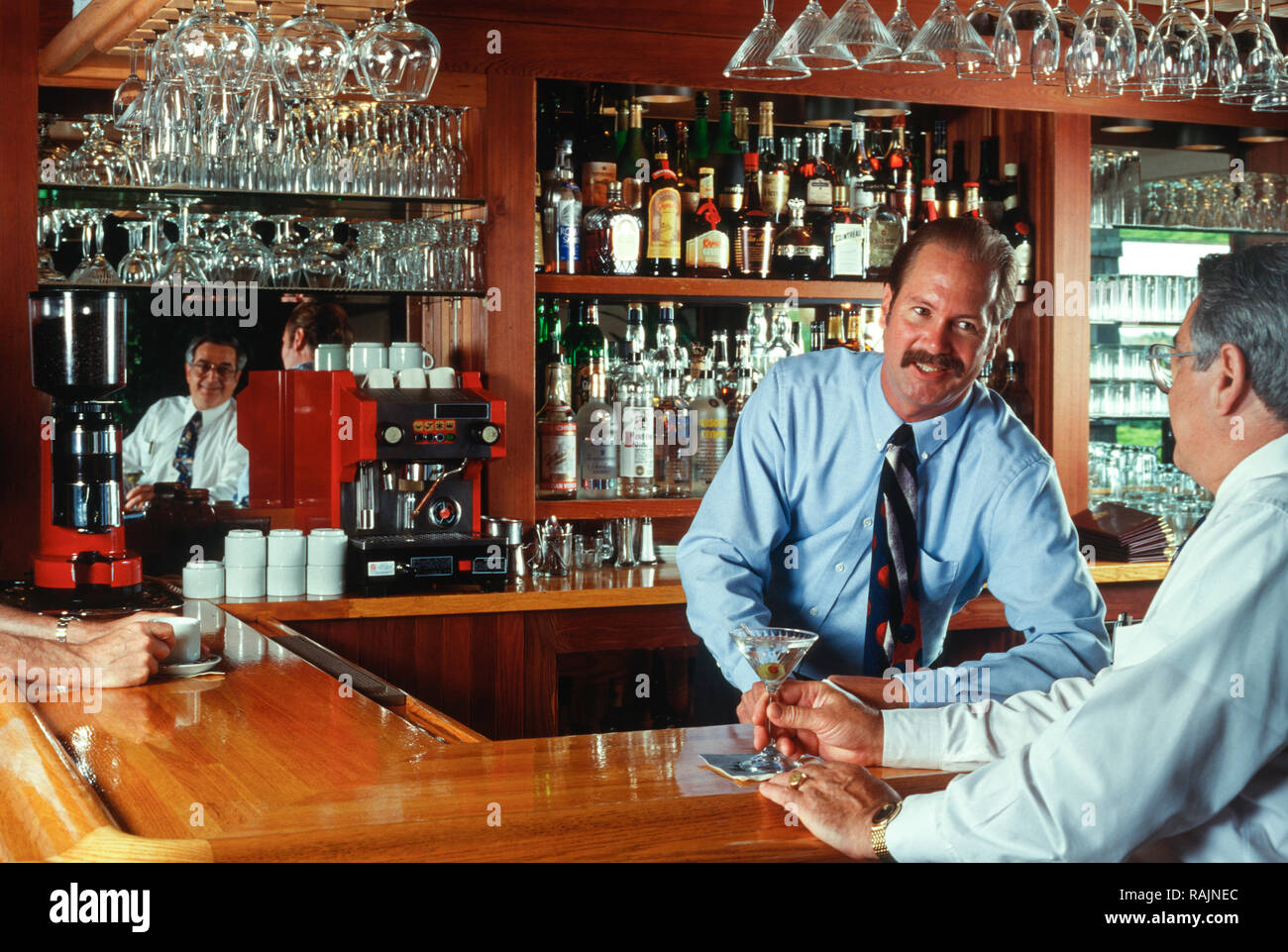 Liquor bottles behind bar hi-res stock photography and images - Alamy