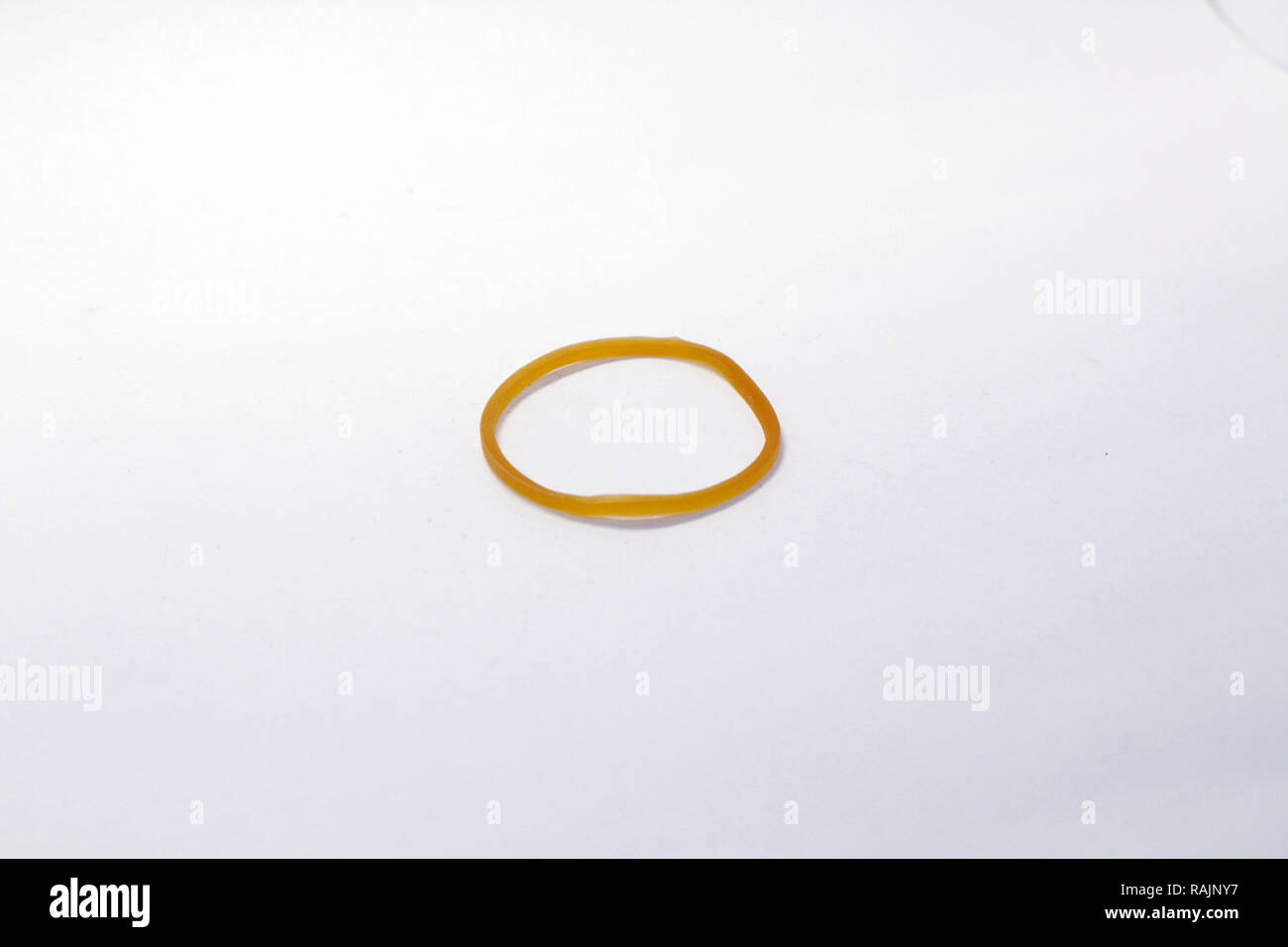 A single and double rubber band, as used in Indonesia. Taken with white ...