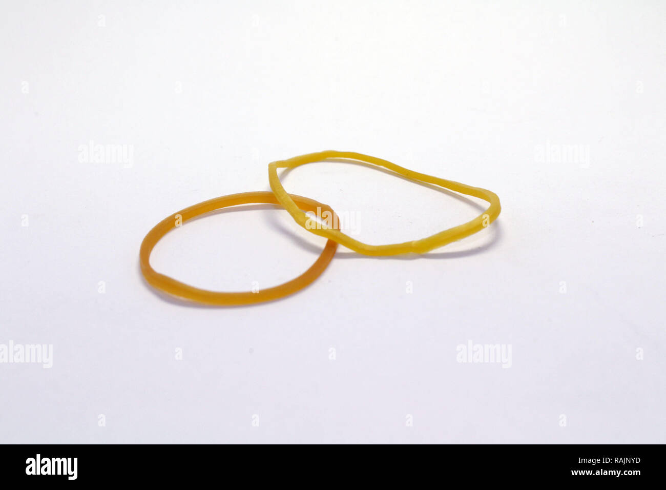 A single and double rubber band, as used in Indonesia. Taken with white ...