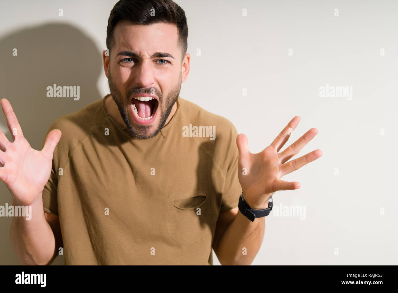 Young handsome man over isolated background very happy and excited ...