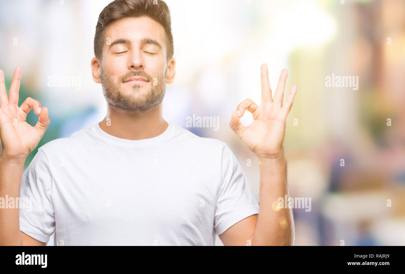 Young handsome man over isolated background relax and smiling with eyes ...