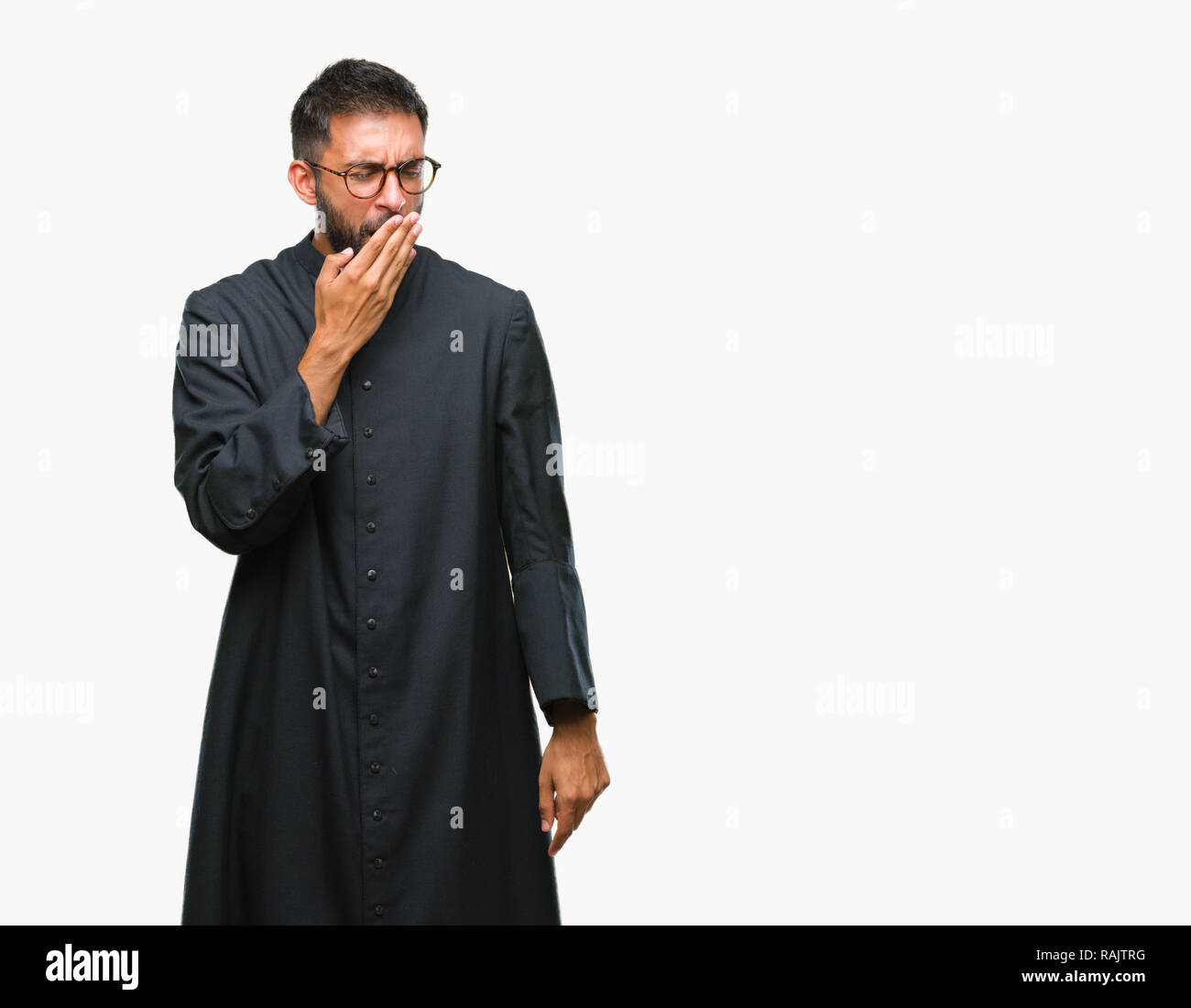Adult hispanic catholic priest man over isolated background bored ...
