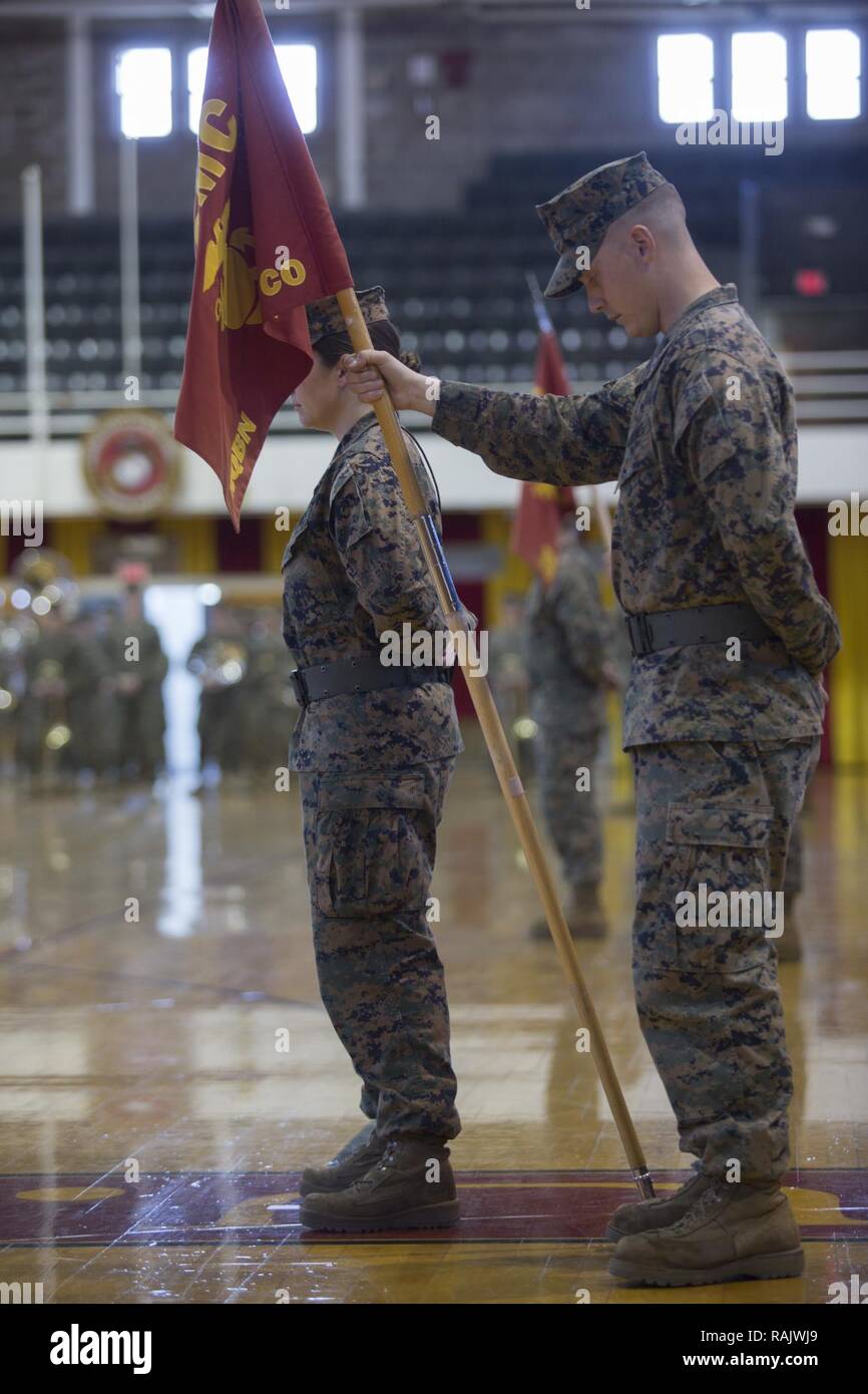 A U.S. Marine with 2nd Marine Division (2d MARDIV), bows his head while ...