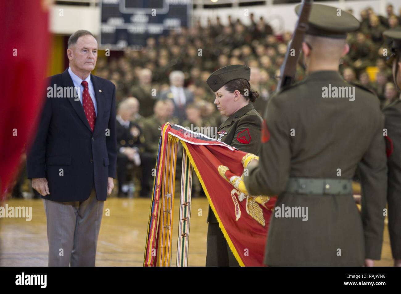 A U.S. Marine with 2nd Marine Division (2d MARDIV), right, along with ...